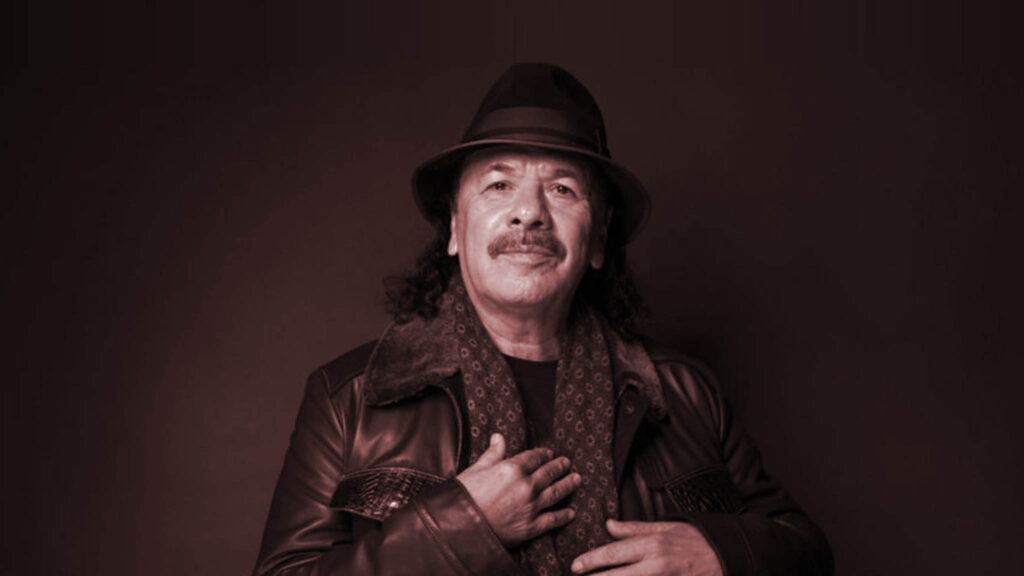 Carlos in the Background. by John Anderson